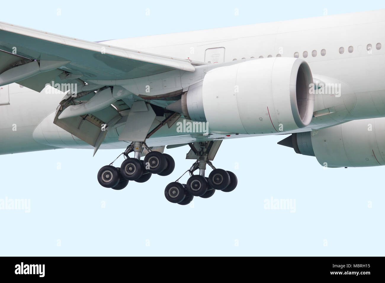 Jet engine and wing with flaps, rubber wheel chassis, close-up before ...