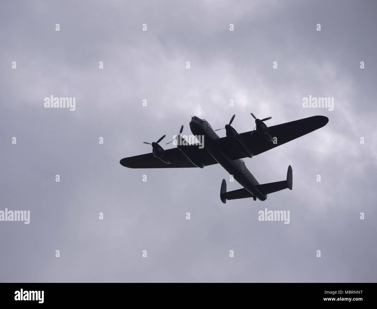Lancaster bomber over the Lincs wolds railway, Ludborough Stock Photo ...