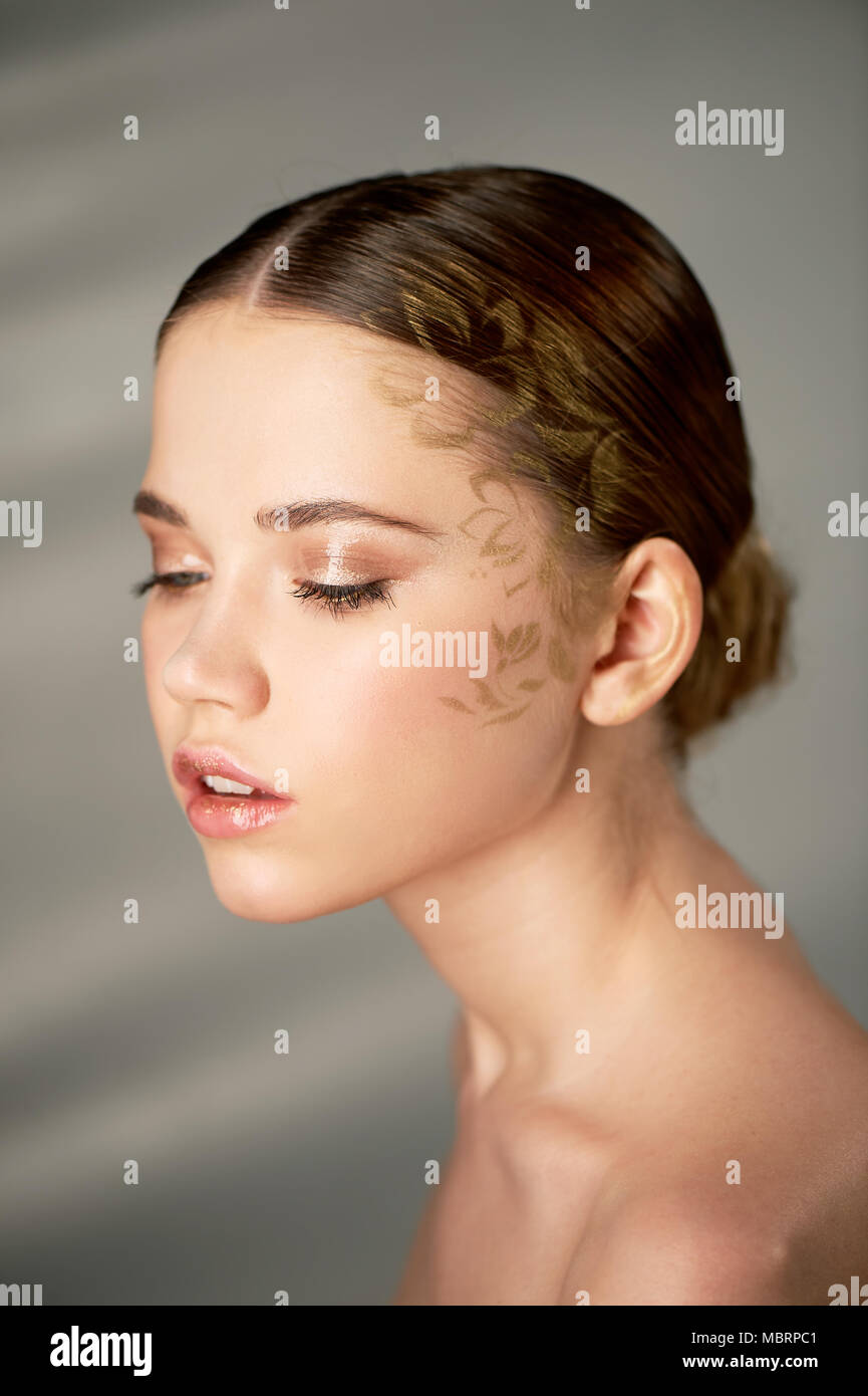 Portrait of young beautiful girl in Studio, with professional makeup ...
