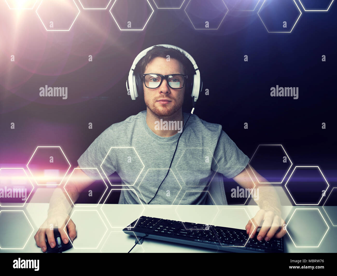 Black male programmer in headphones hi-res stock photography and images ...
