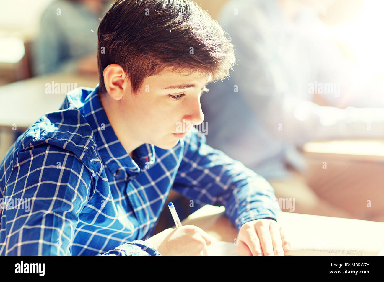 Boy test writing hi-res stock photography and images - Alamy
