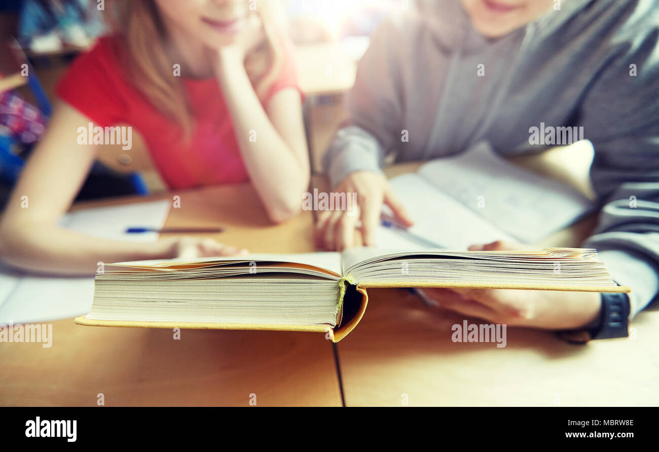 high school students reading book and learning Stock Photo - Alamy