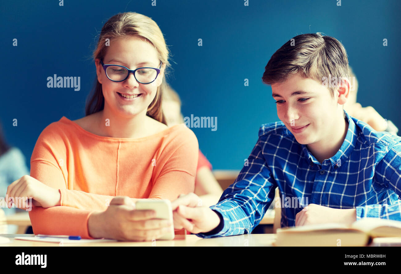 Teenager texting classroom hi-res stock photography and images - Alamy