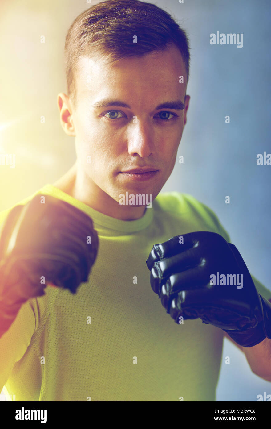 young man in boxing gloves Stock Photo - Alamy