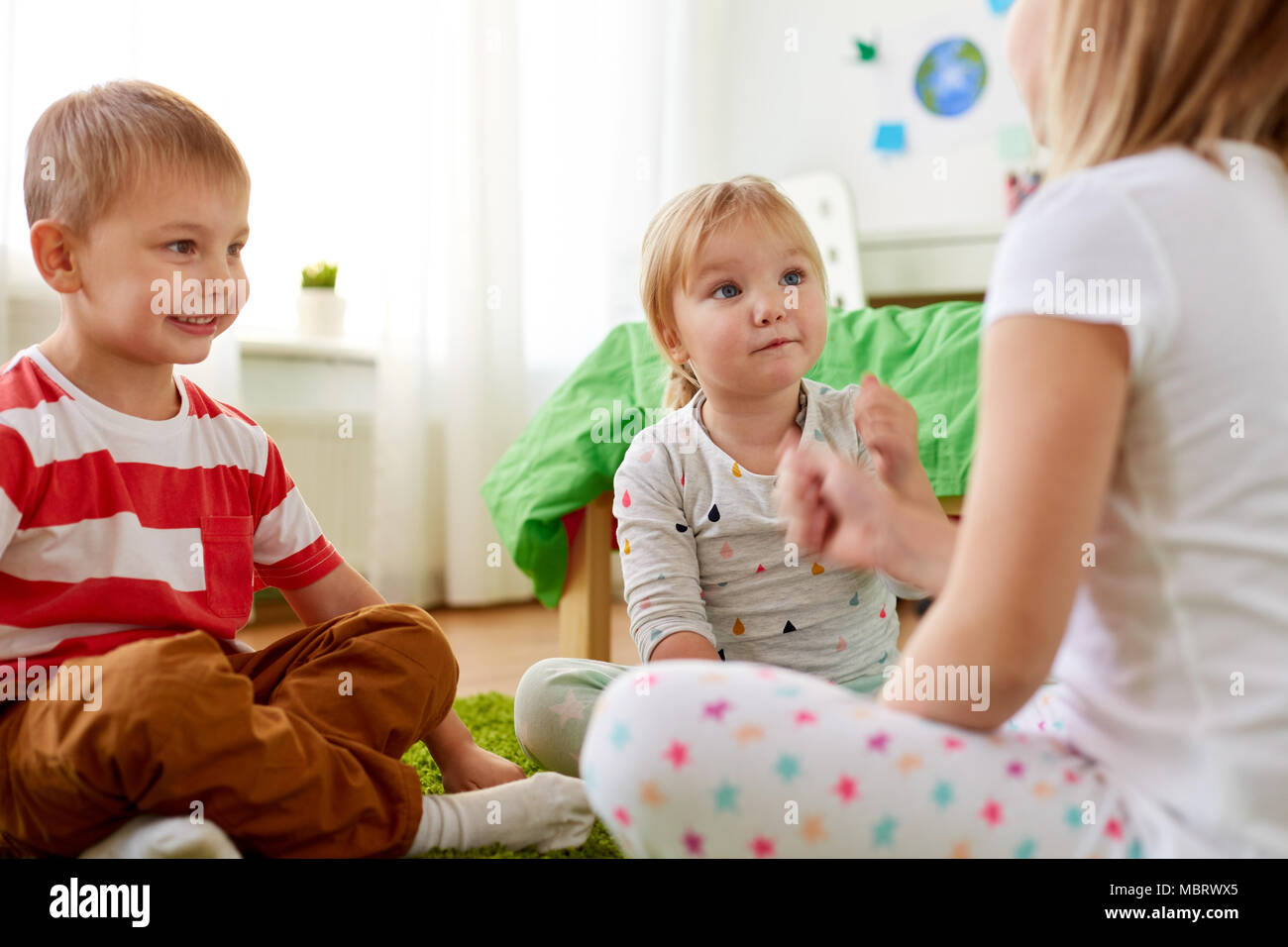 kids playing rock-paper-scissors game at home Stock Photo - Alamy