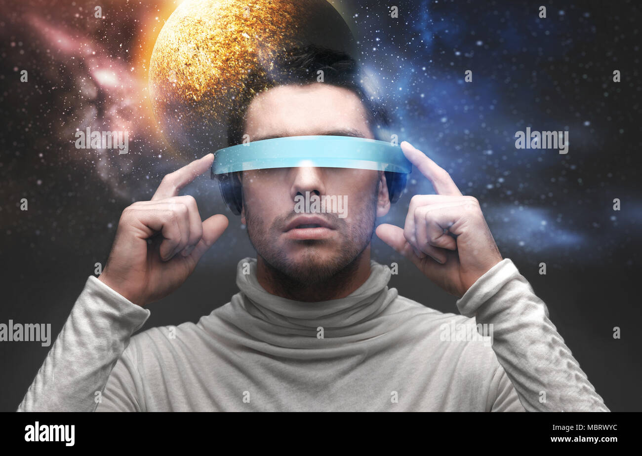 man in 3d glasses over space background Stock Photo - Alamy