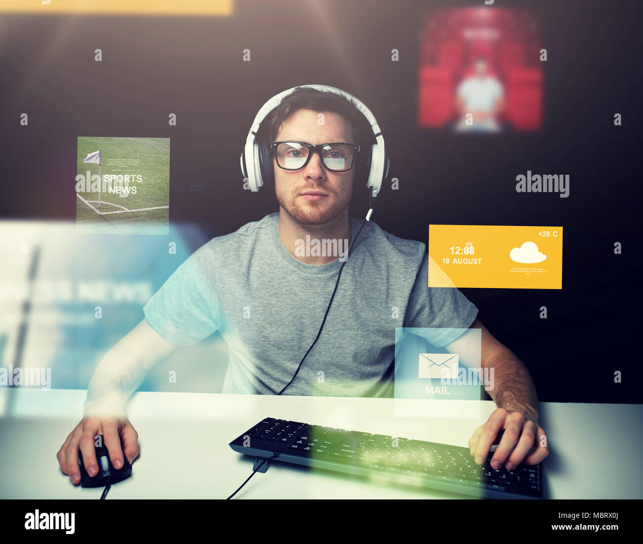 man in headset computer over virtual media screens Stock Photo - Alamy