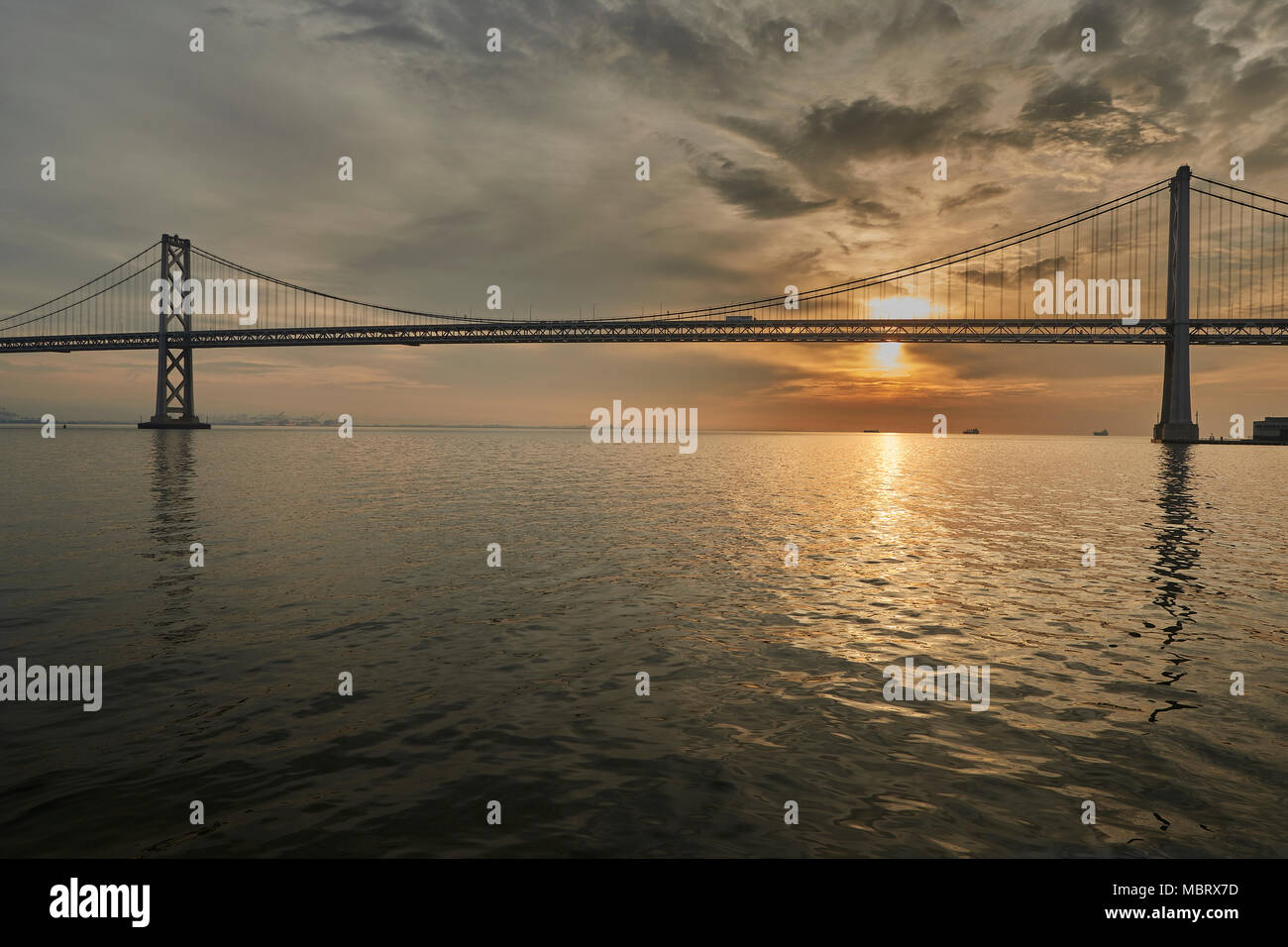 Sun Rising Over The San Francisco-Oakland Bay Bridge Stock Photo - Alamy