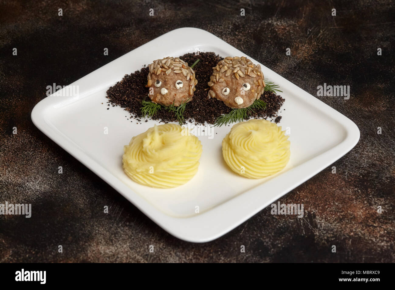 Meat cutlets in hedgehog shape and mashed potato. Creative kids menu ...
