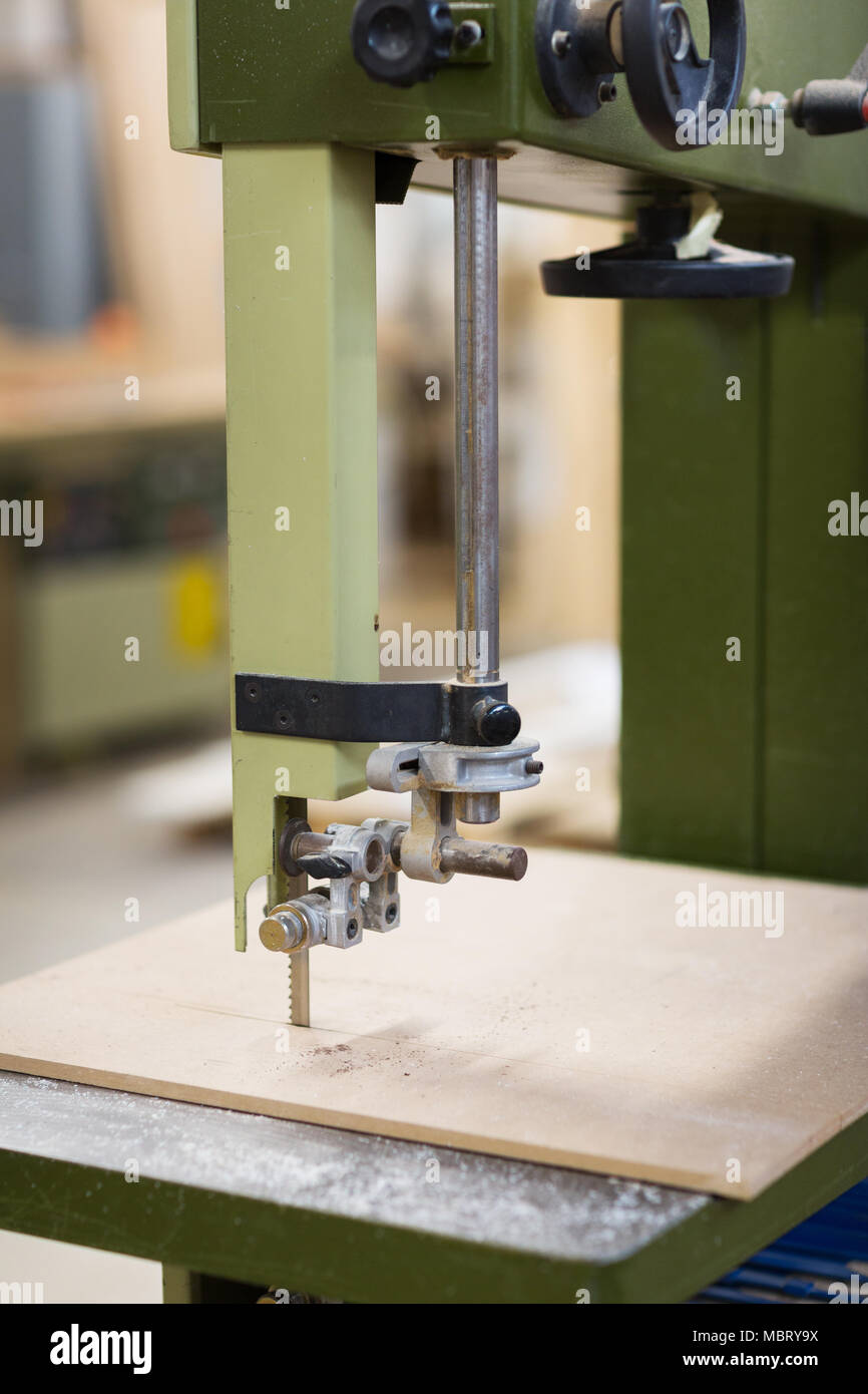 jig saw machine sawing board at workshop Stock Photo - Alamy