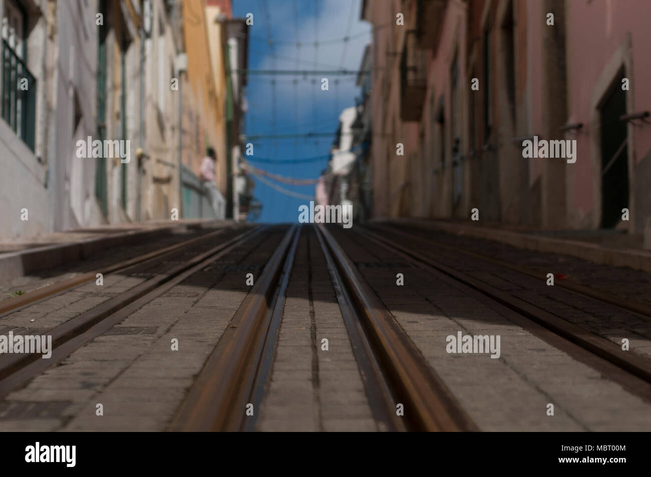 cable car tracks climbing to Bica district in Lisbon Stock Photo - Alamy