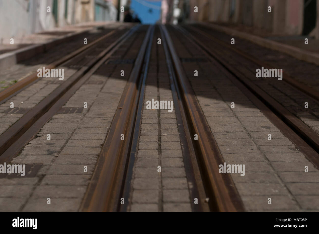 cable car tracks climbing to Bica district in Lisbon Stock Photo - Alamy