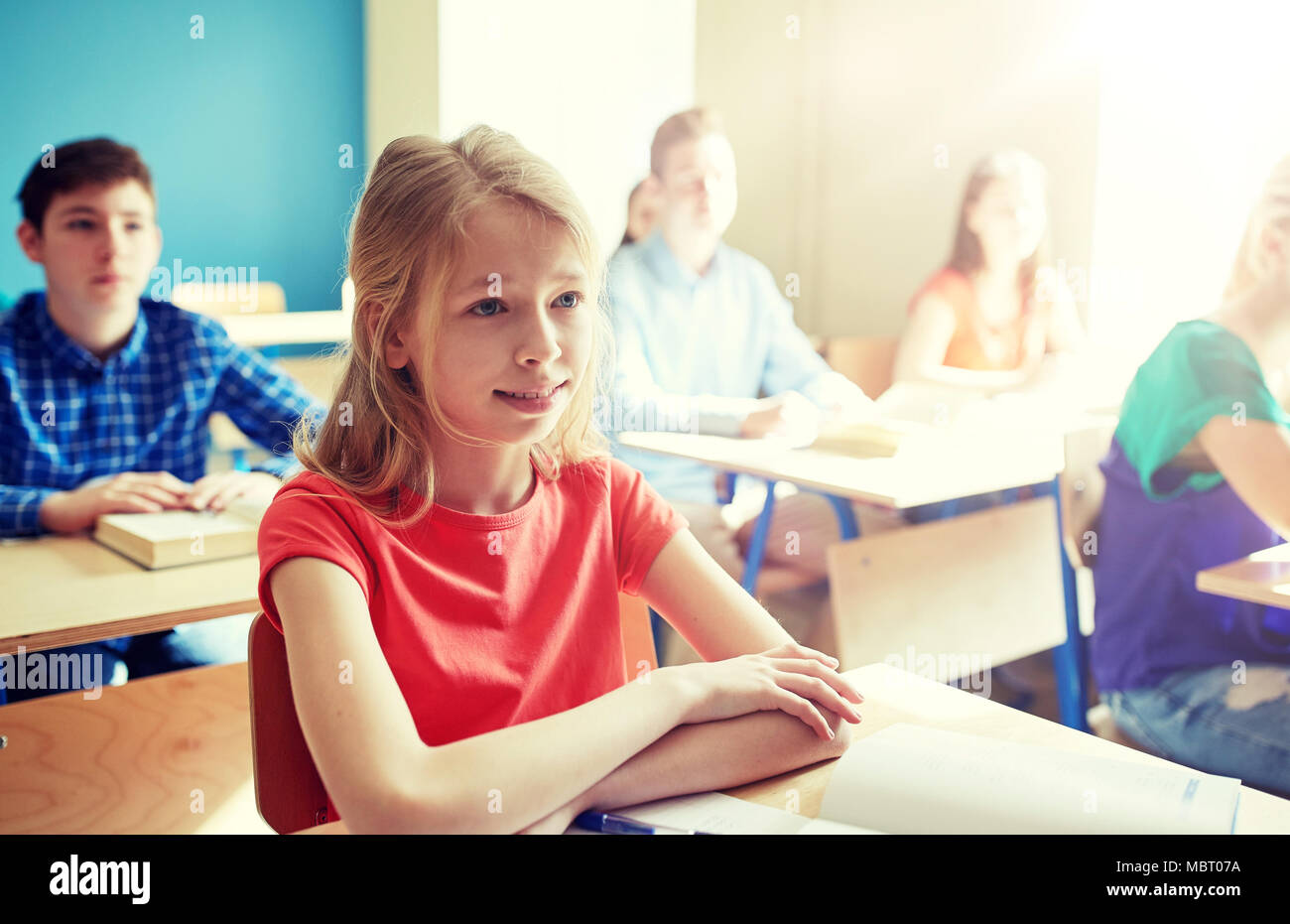 happy student girl at school lesson Stock Photo - Alamy