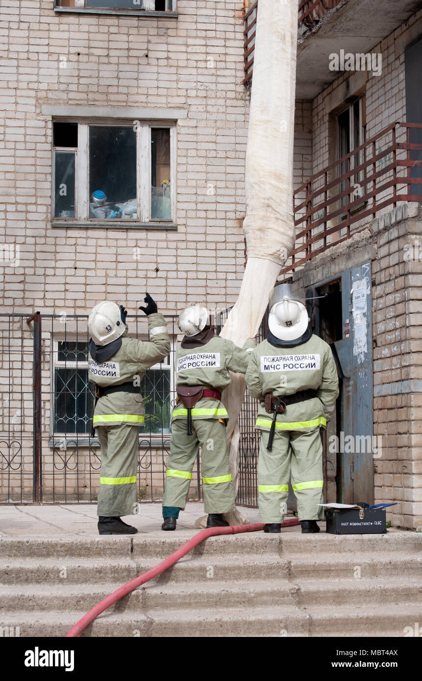 Firefighters evacuate residents with the help of a fire rescue device ...