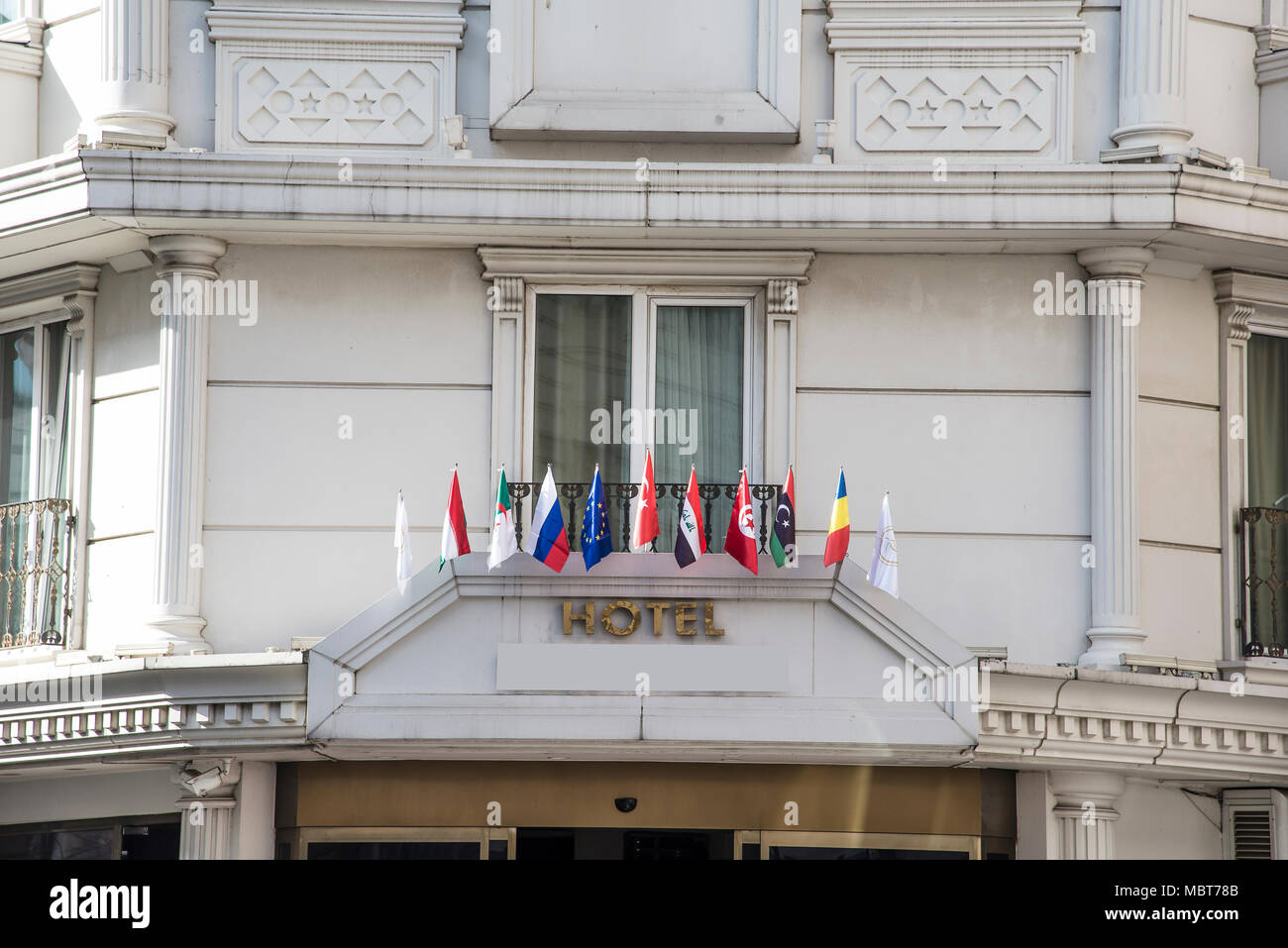 Hotel sign on the wall in the city Stock Photo - Alamy