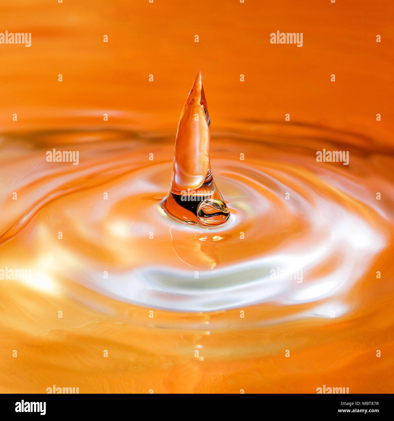 Colorful water drop splash in water macrophotography Stock Photo - Alamy