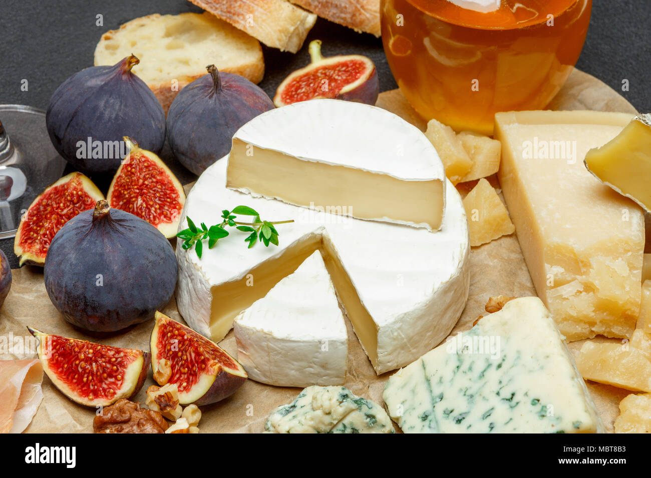 Wedge of brie cheese hi-res stock photography and images - Alamy