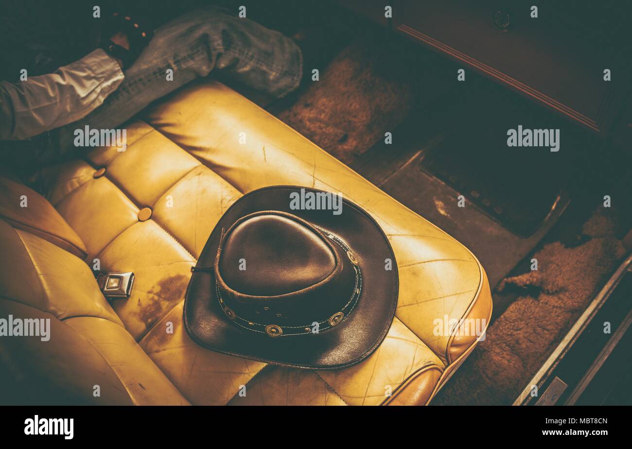 Cowboy Classic Ride. Leather Cowboy Hat on the Seat of Vintage Car ...