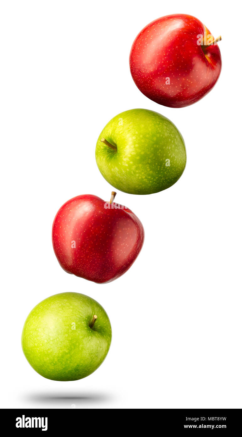 Falling red and green apples on white background Stock Photo - Alamy