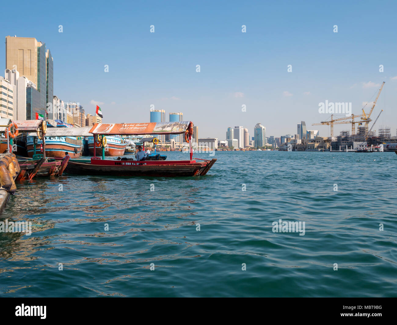 DUBAI,UAE - DECEMBER, 2017: Abra ferries crossing Dubai Creek that ...