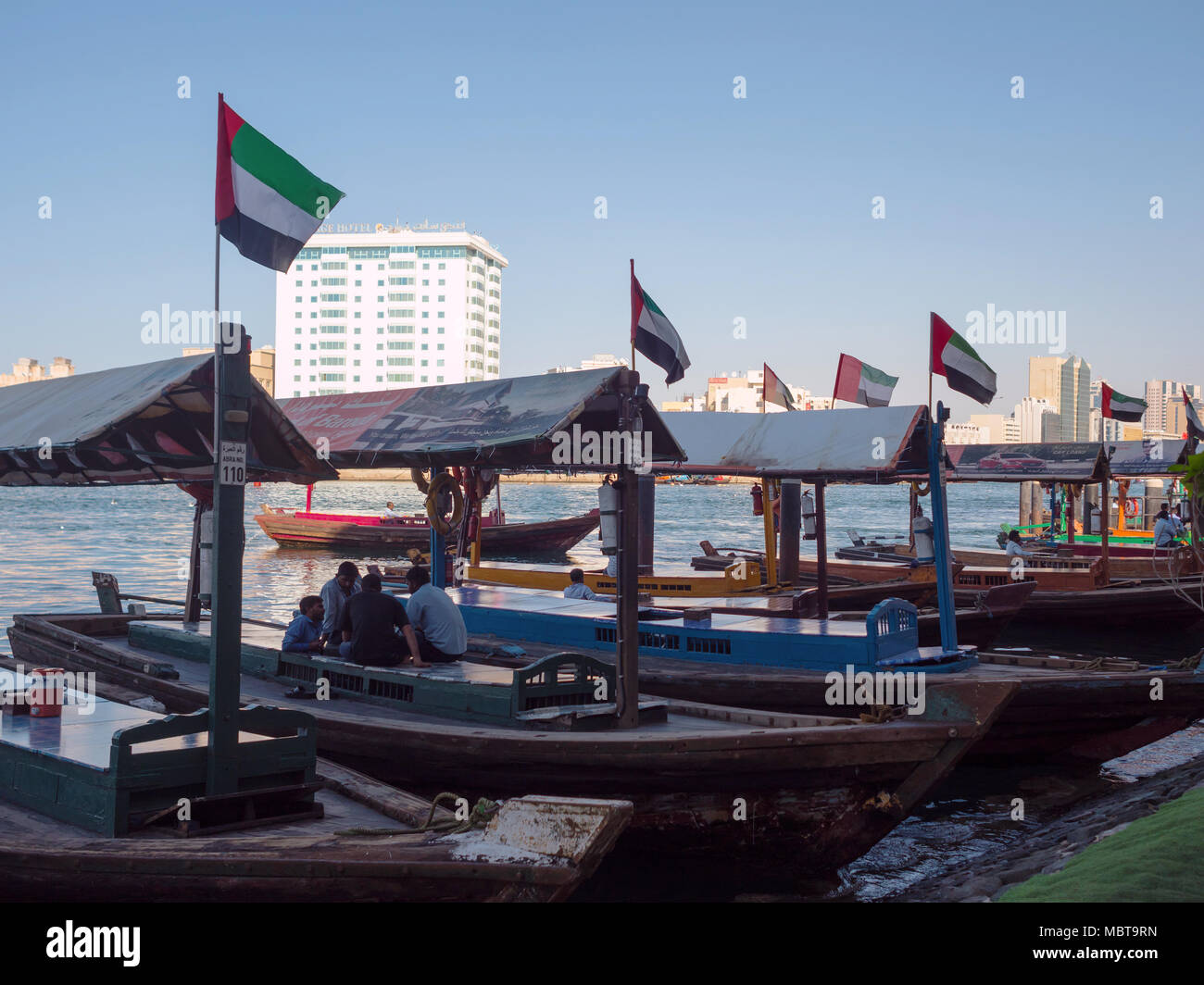 DUBAI,UAE - DECEMBER, 2017: Abra ferries crossing Dubai Creek that ...