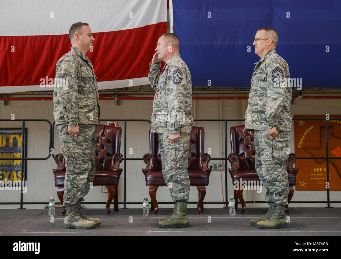 Chief Master Sgt. Michael Cornitius salutes Colonel Gary Jones, the ...