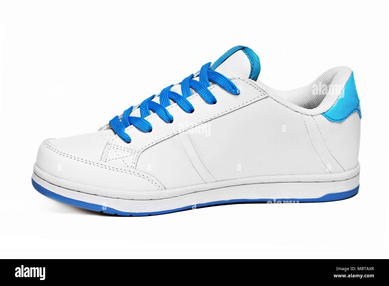 White sport shoe isolated on white background Stock Photo - Alamy