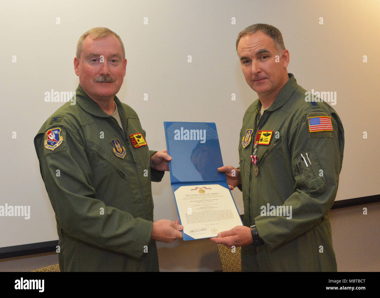 Col. Douglas E. Gullion (left), 507th Air Refueling Wing commander ...