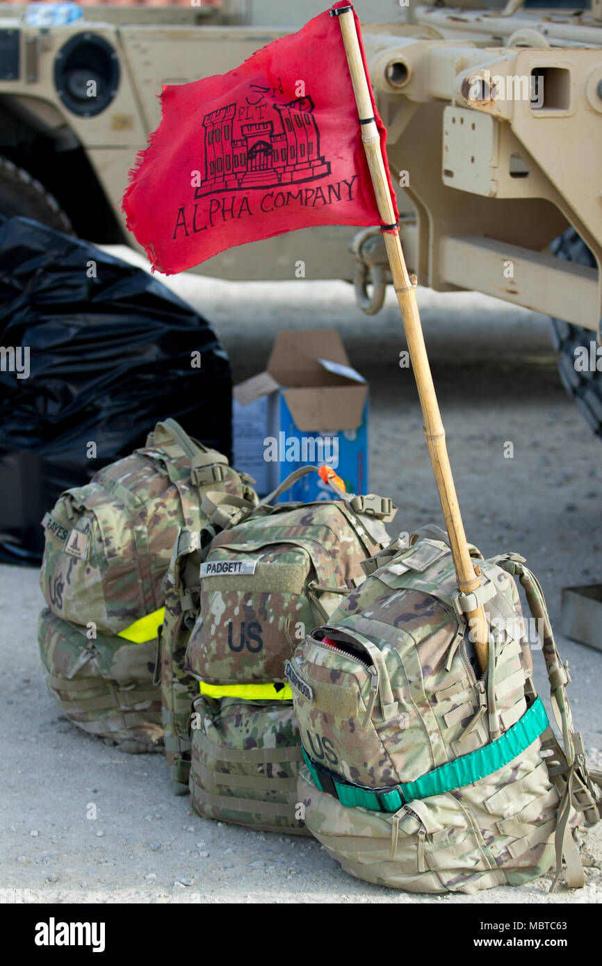 Rucksacks and a guidon belonging to a team from Alpha Company, 40th ...
