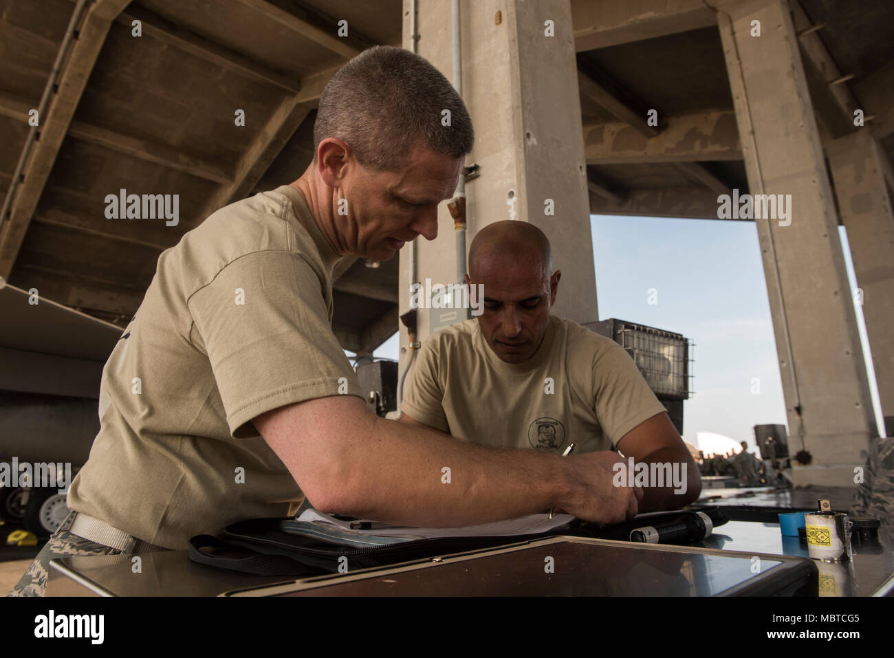 U.S. Air Force Col. Britt Hurst, left, 18th Operations Group commander ...