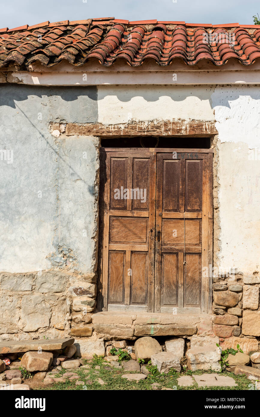 Old wooden door in old adobe house with tile roof Stock Photo - Alamy Old wooden door in old adobe house with tile roof Stock Photo - Alamy