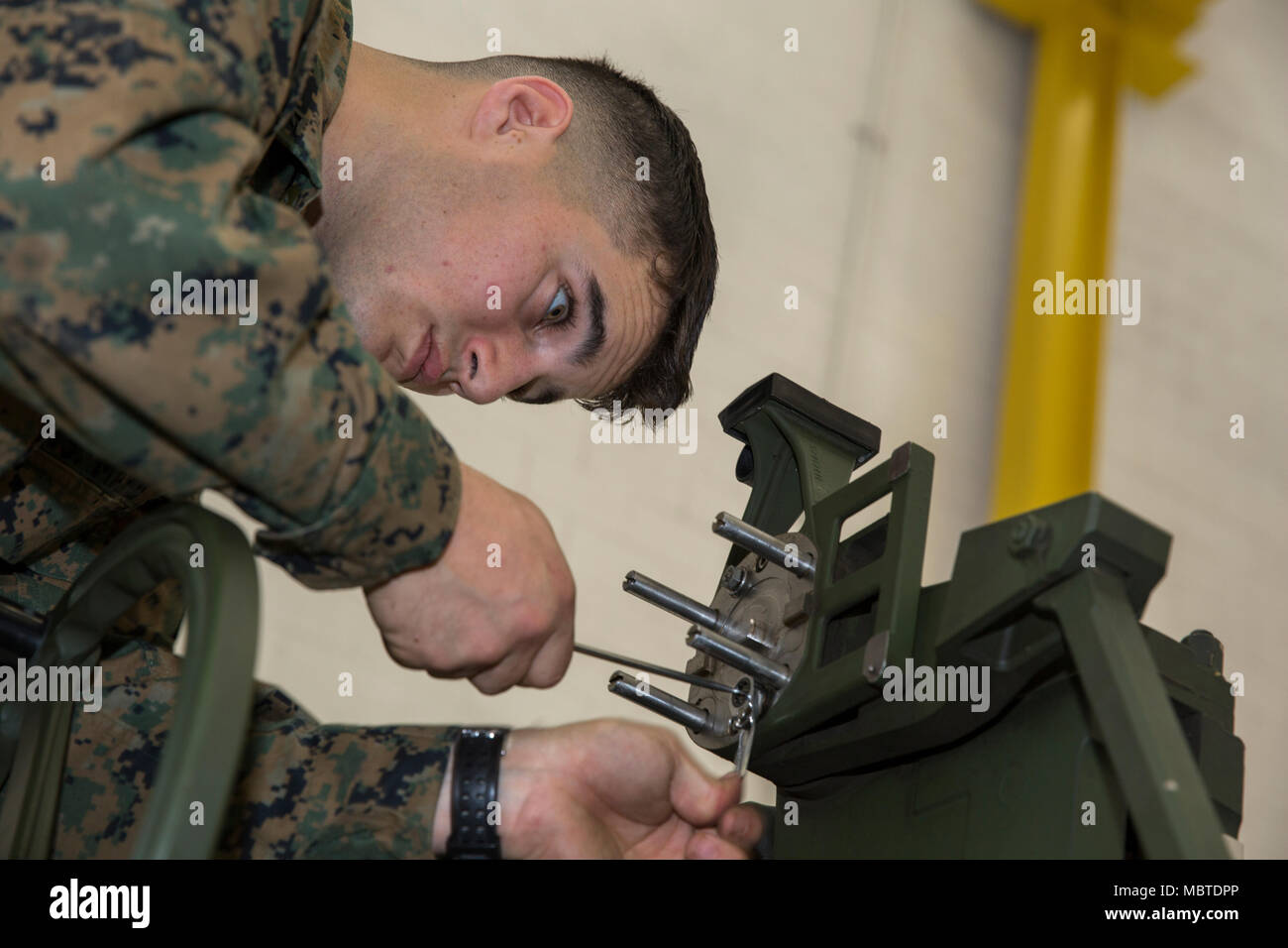 LCpl. Nicholas Wolfe, an electra-optical ordnance repairer with ...