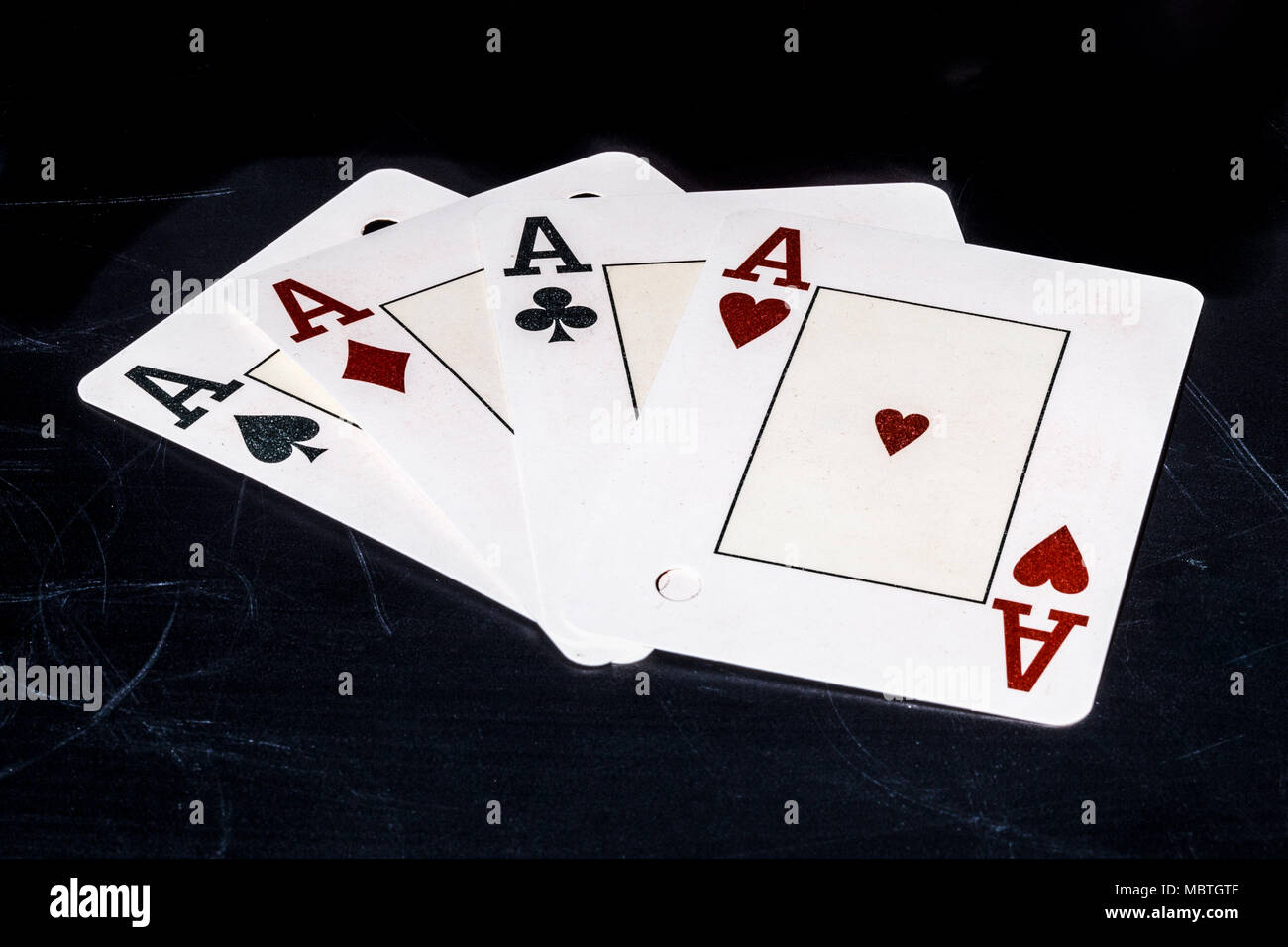 four aces shape on school blackboard concept, photo with space for text ...