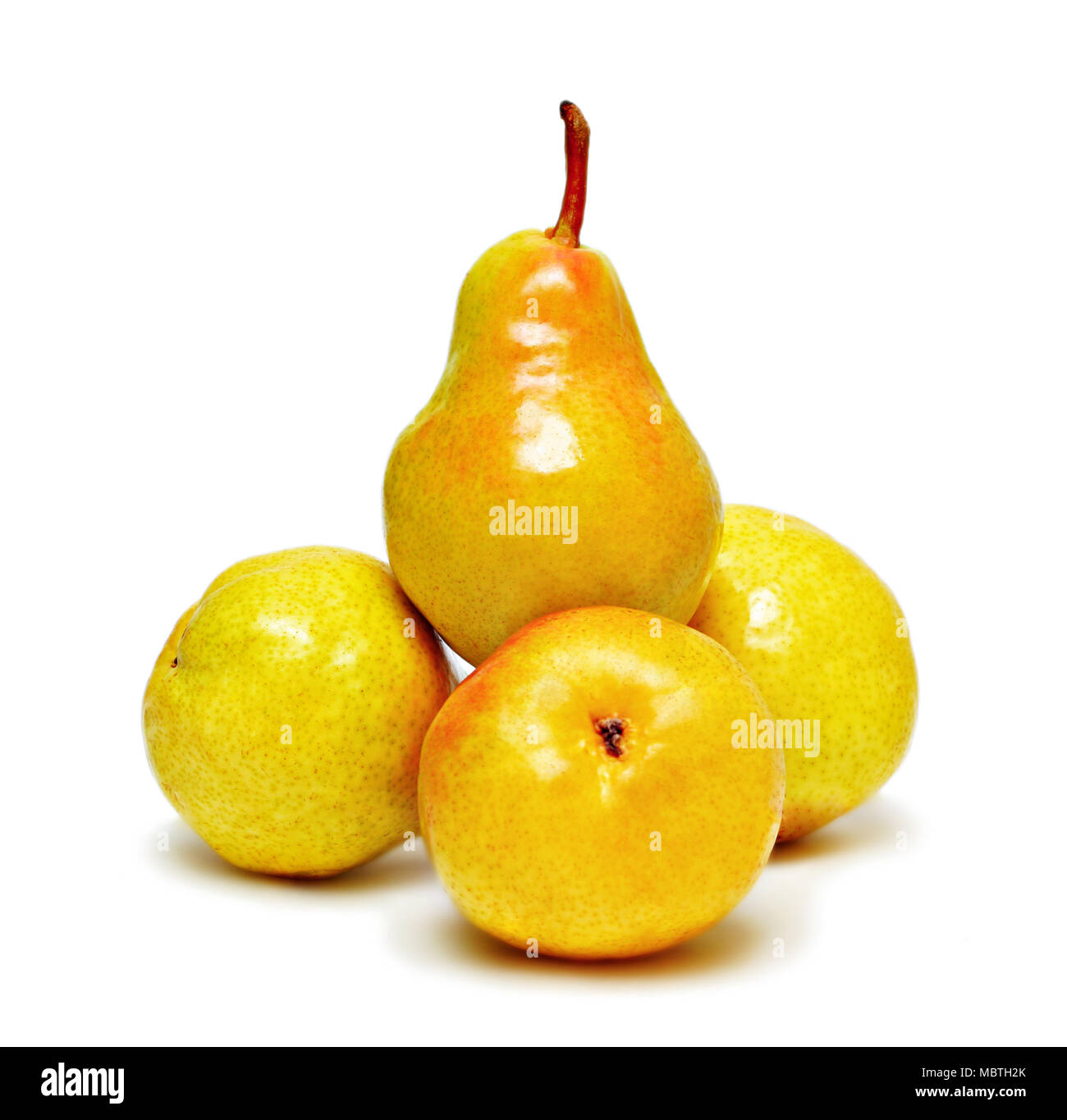 Four ripe pears isolated on white background Stock Photo - Alamy