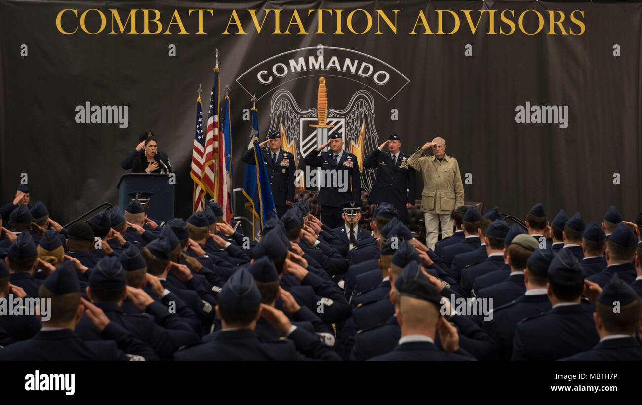 Air Commandos and honored guests render appropriate customs during a ...