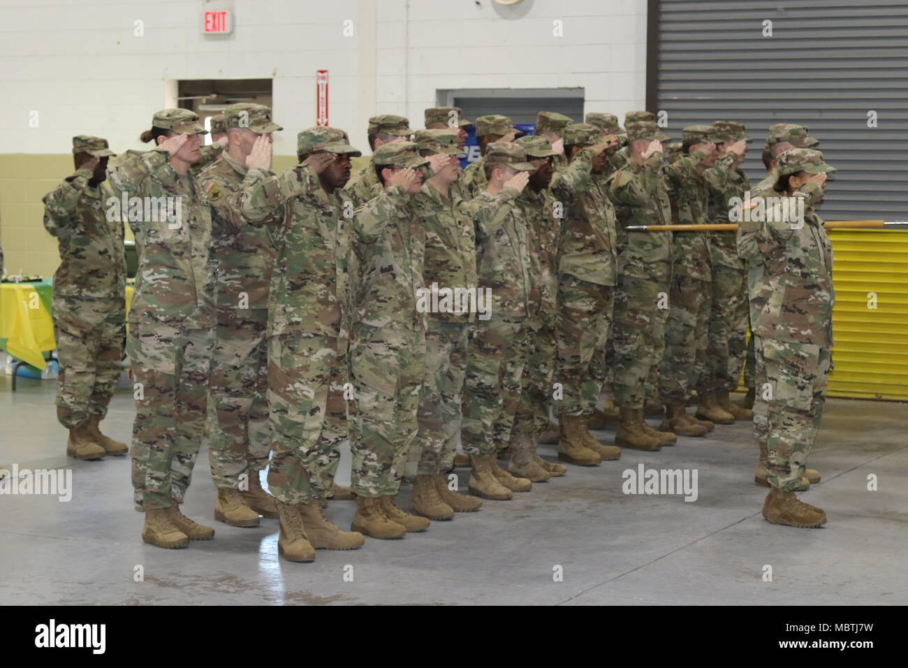 Members of the 113th Military Police Company salute the colors during ...