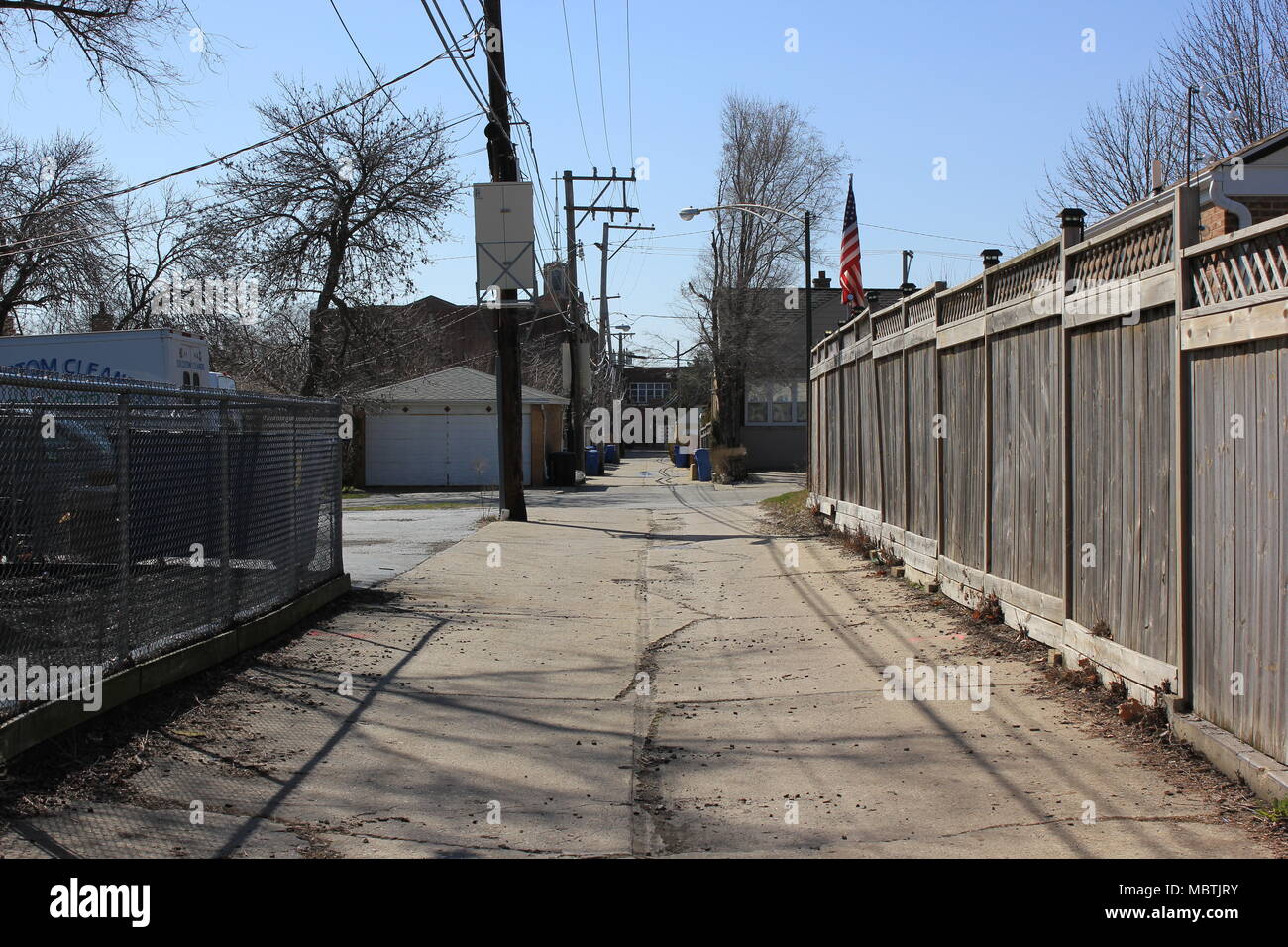 Residential alley streetscape in the big city Stock Photo - Alamy