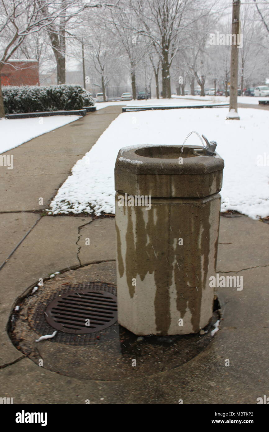 Working drinking fountain in a Chicago park in April. It's a sure sign ...