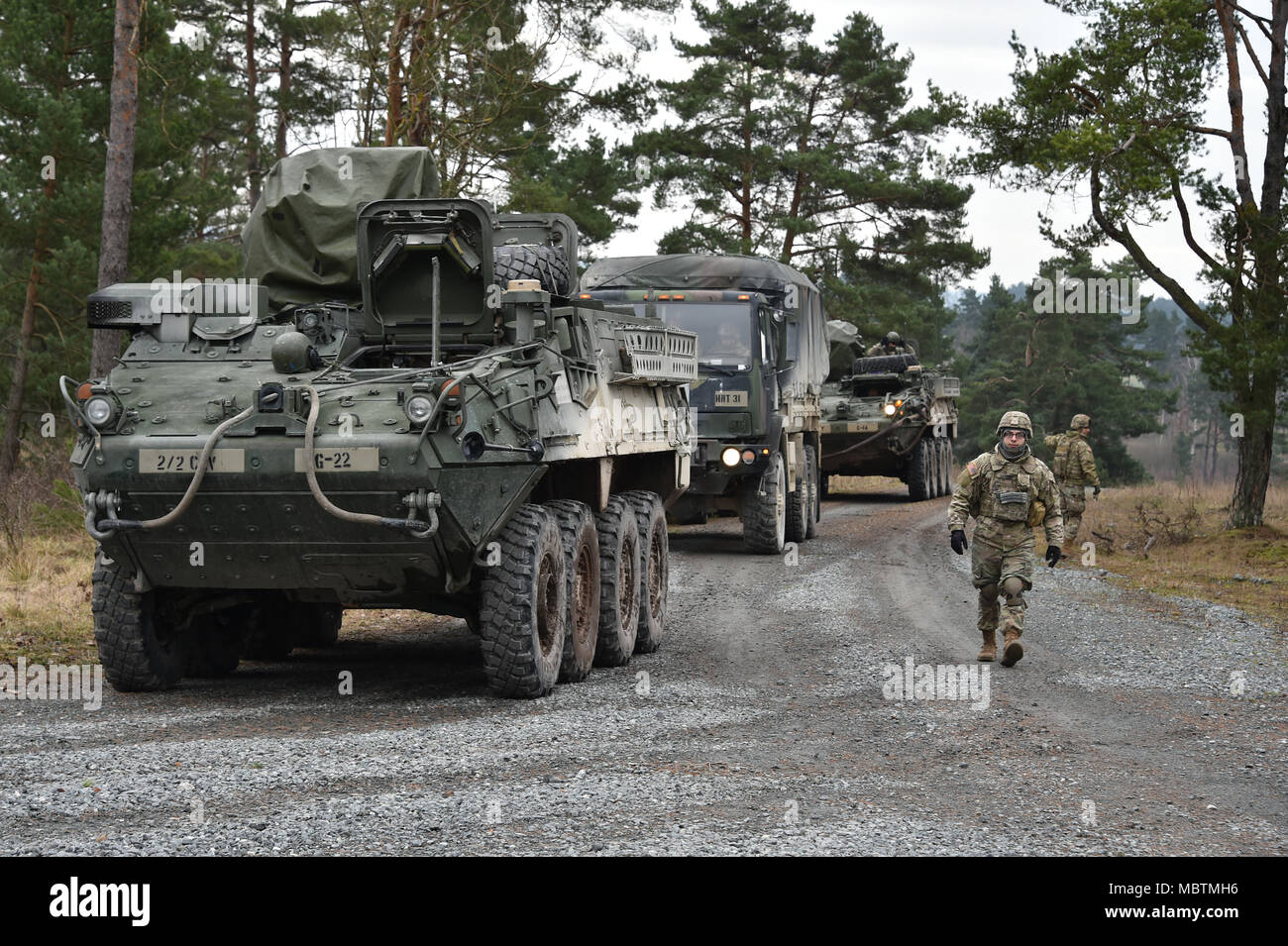U.S. Soldiers with 2d Squadron, 2d Cavalry Regiment maneuver vehicles ...