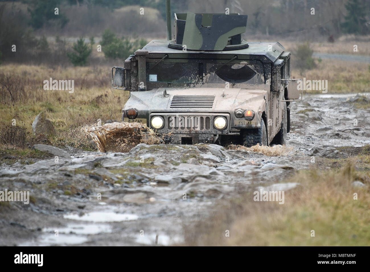 U.S. Soldiers with 2d Squadron, 2d Cavalry Regiment maneuver a High ...