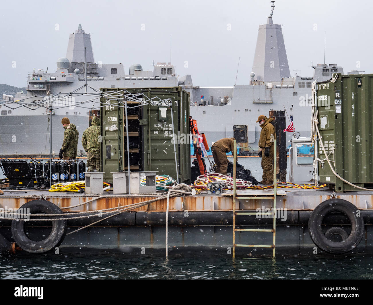 U.S. Navy Seabees, assigned to Underwater Construction Team (UCT) 2 ...