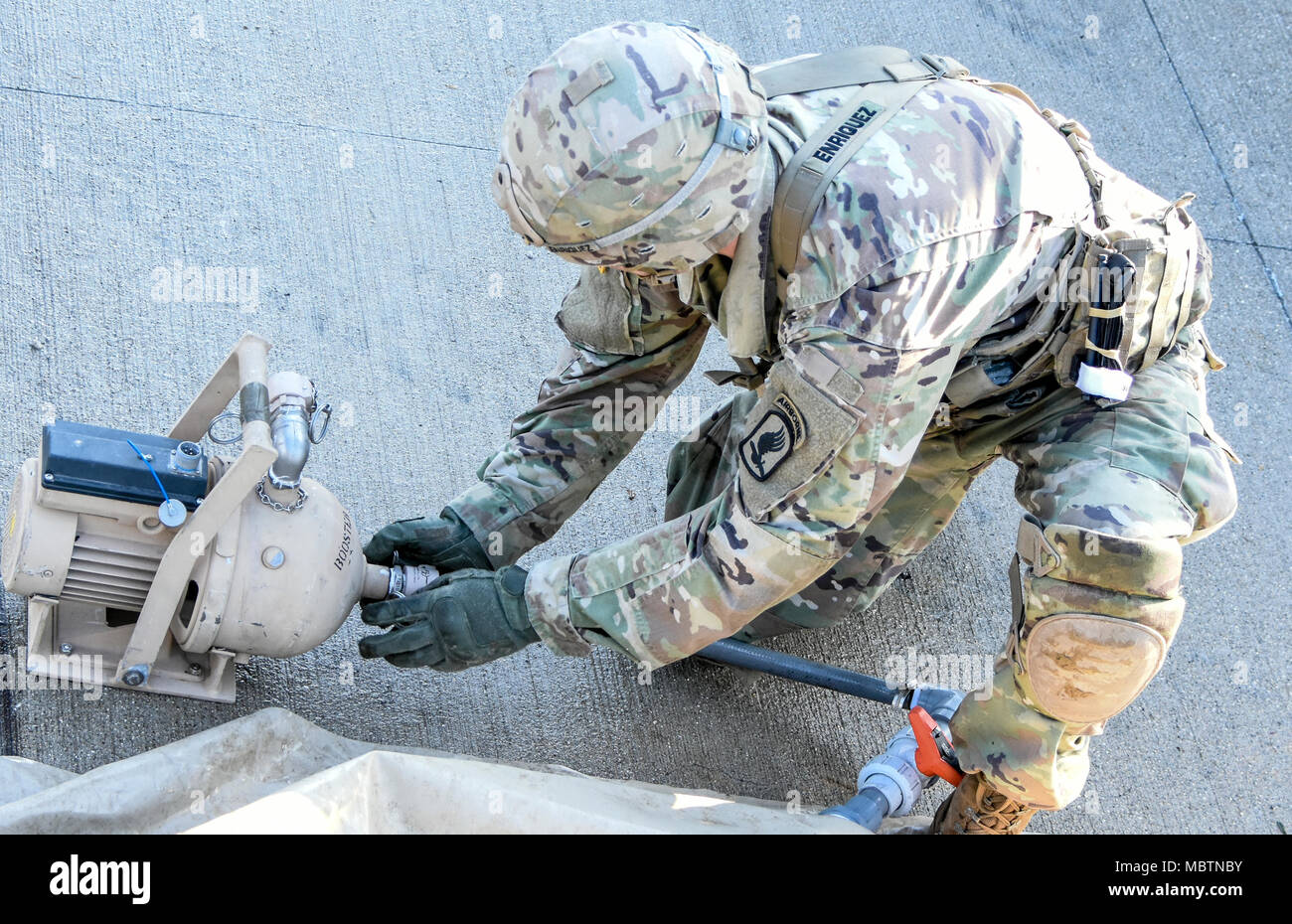 An Airborne Water Purification Specialist from the Brigade Support ...