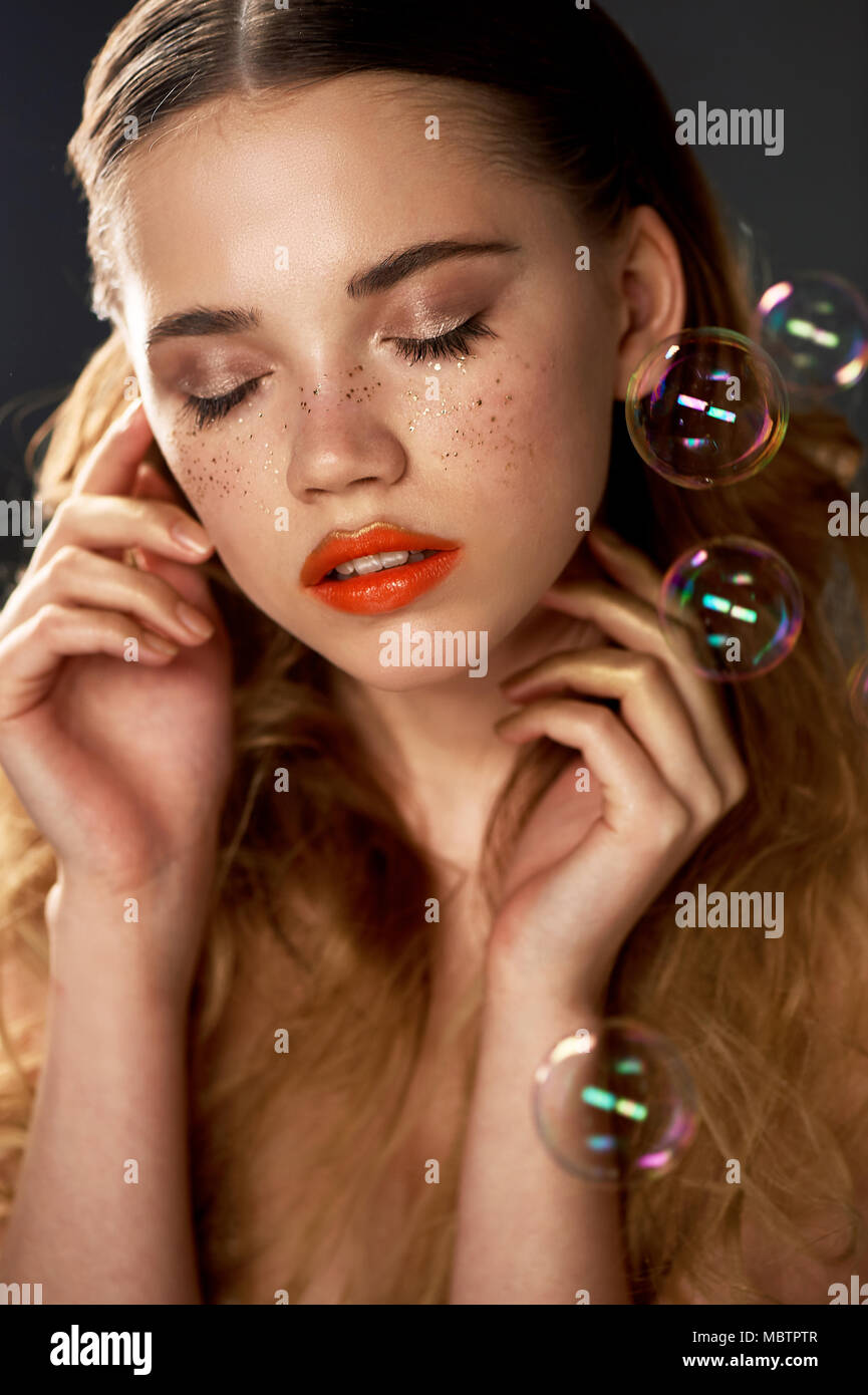 Portrait of young beautiful girl in Studio, with professional makeup ...