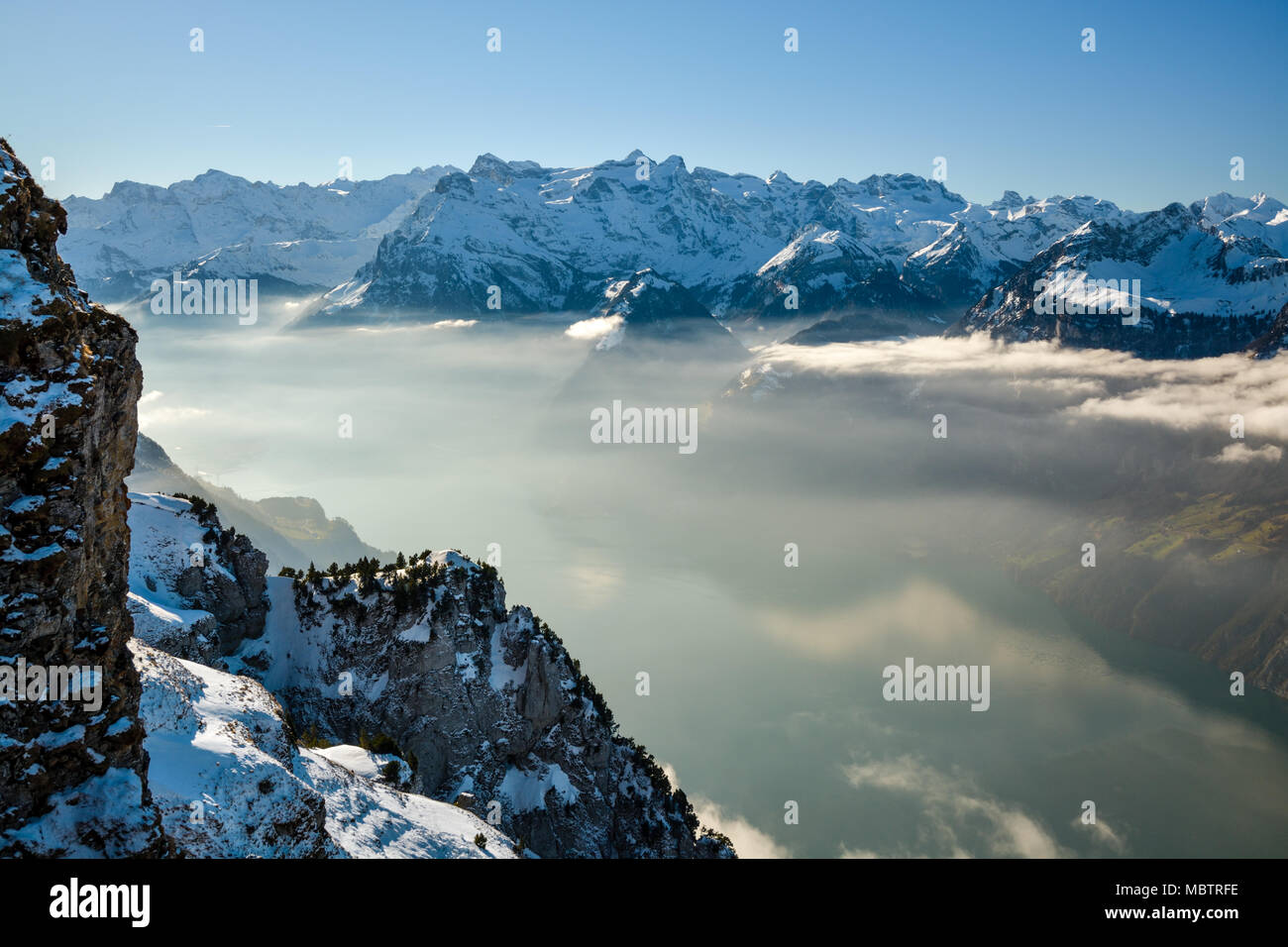 Lake Lucerne in Swiss Alps covered by fog Stock Photo - Alamy