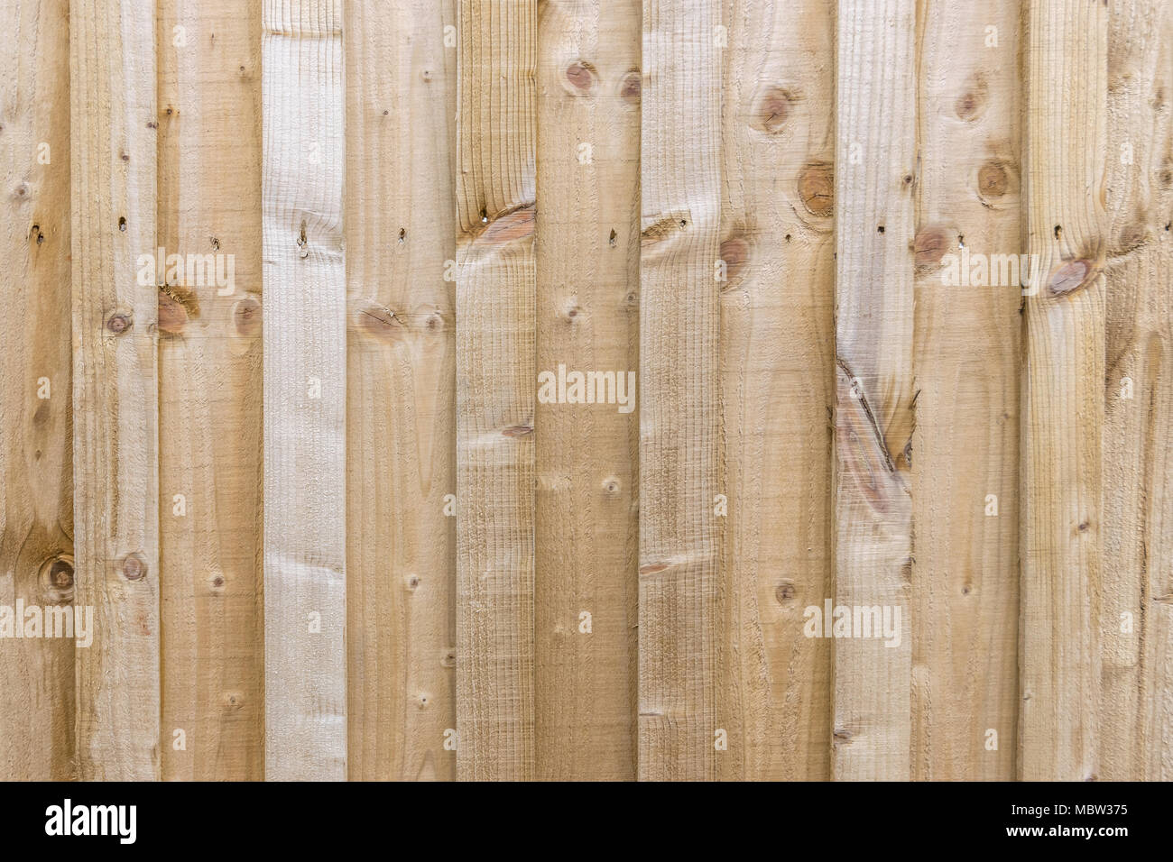 Small plank sectioned fence panel long background Stock Photo - Alamy