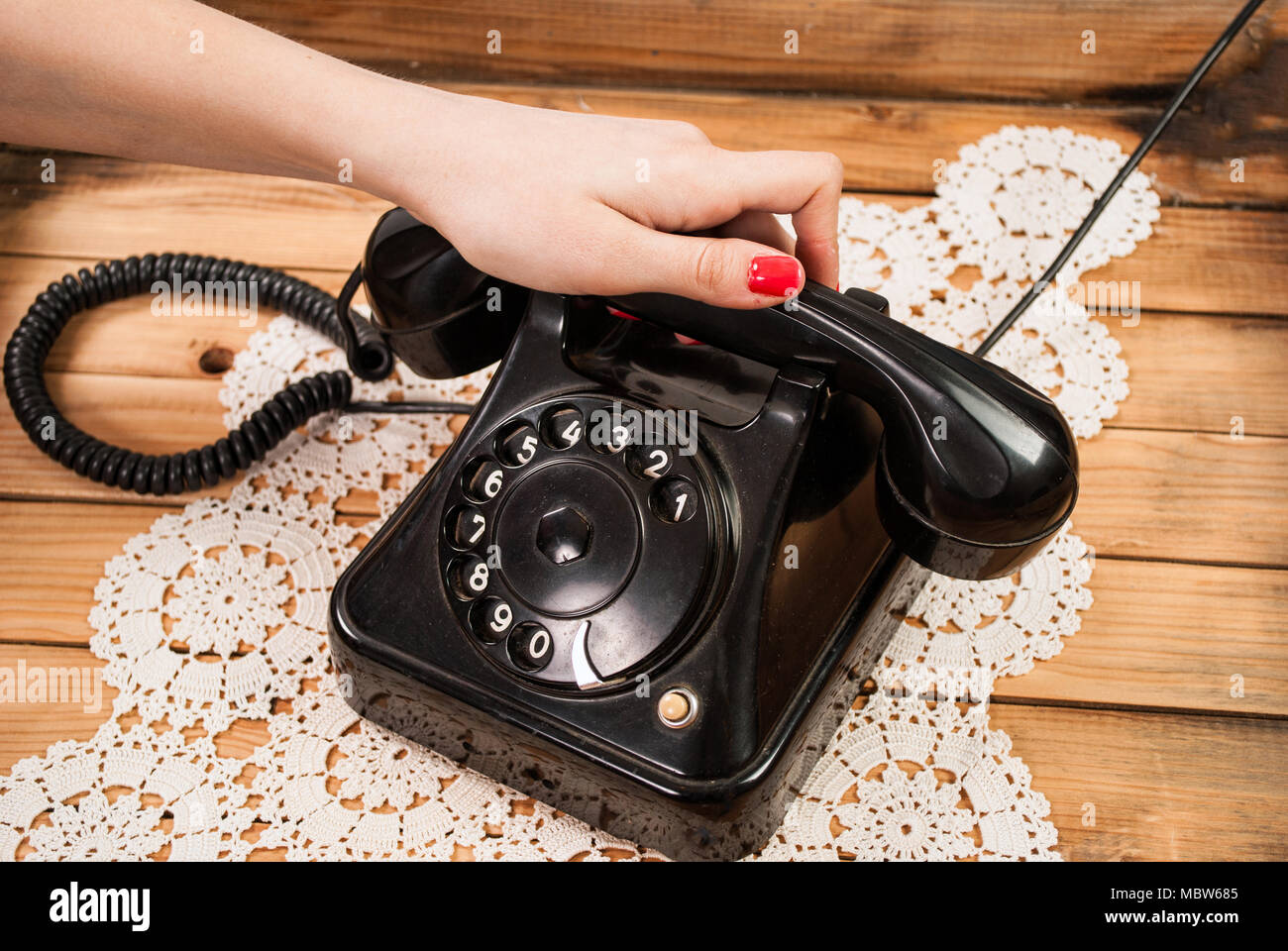 Female on rotary dial up phone hi-res stock photography and images - Alamy