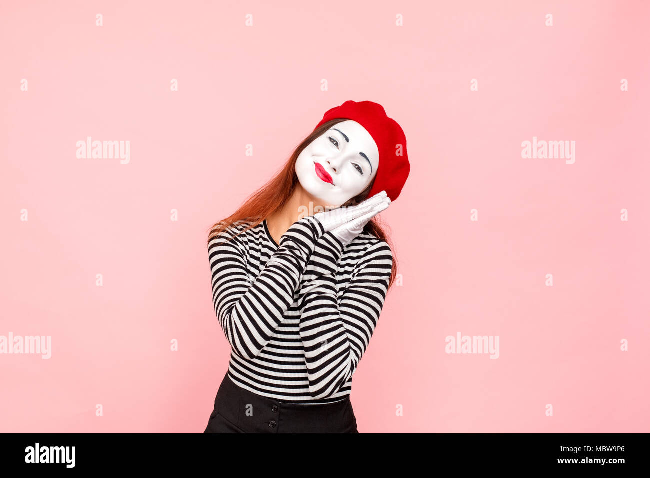 Portrait of handsome mime woman sleeping. Clown, artist , mime. Studio ...