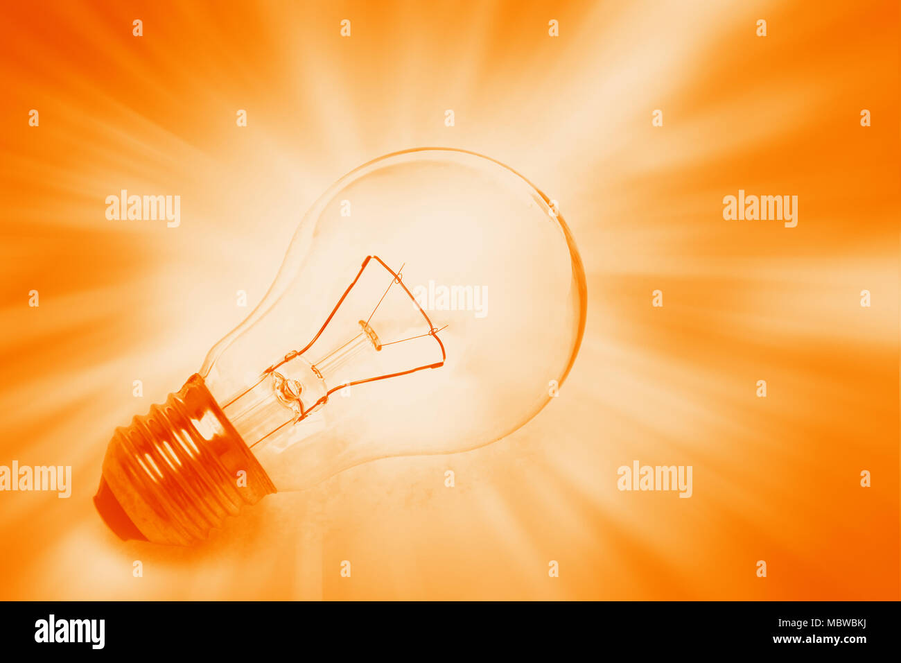 Light bulb on bright background Stock Photo - Alamy