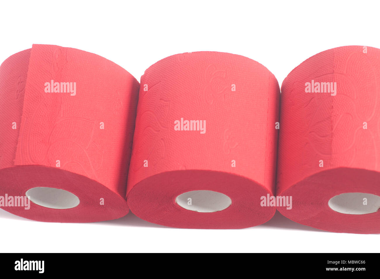 Red toilet paper isolated on a white background Stock Photo - Alamy