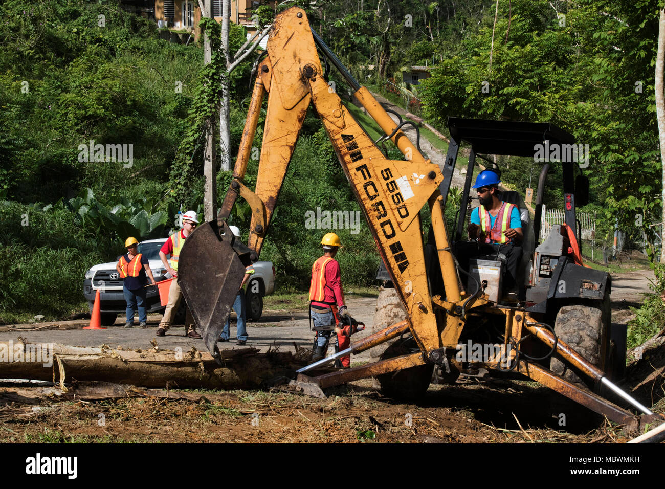 A contract crew working as part of the U.S. Army Corps of Engineers ...